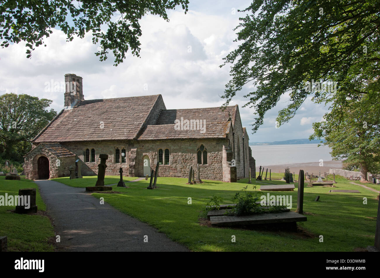 Old Church and churchyard with sea in backdrop Stock Photo - Alamy