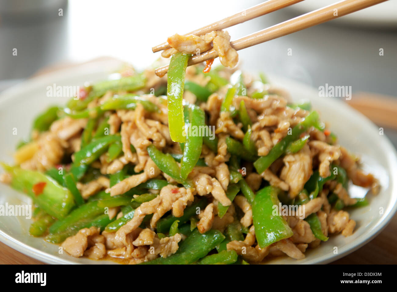 Tasting Chinese Cuisine Food with chopsticks Stock Photo - Alamy