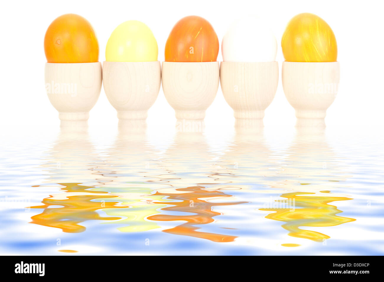 Easter eggs in egg cups Stock Photo - Alamy