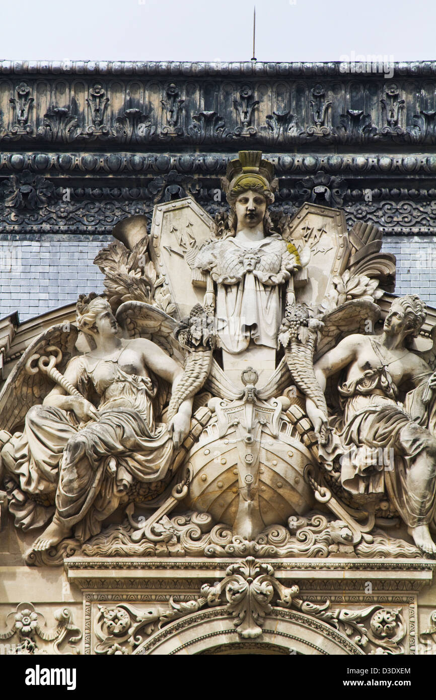 View of the beautiful statues located on the Museum of the Louvre in ...
