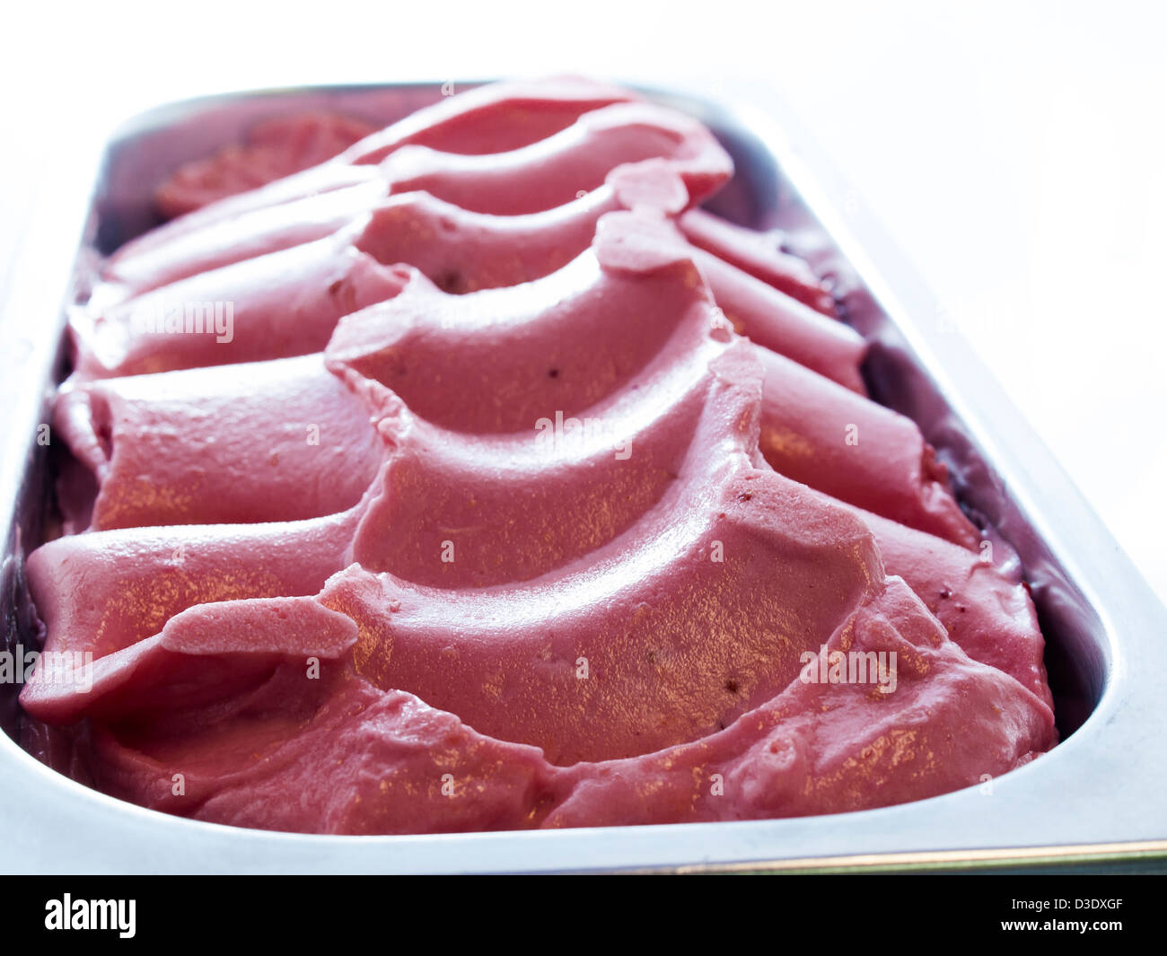 Gourmet sweet orange and cranberry gelato on white background Stock ...