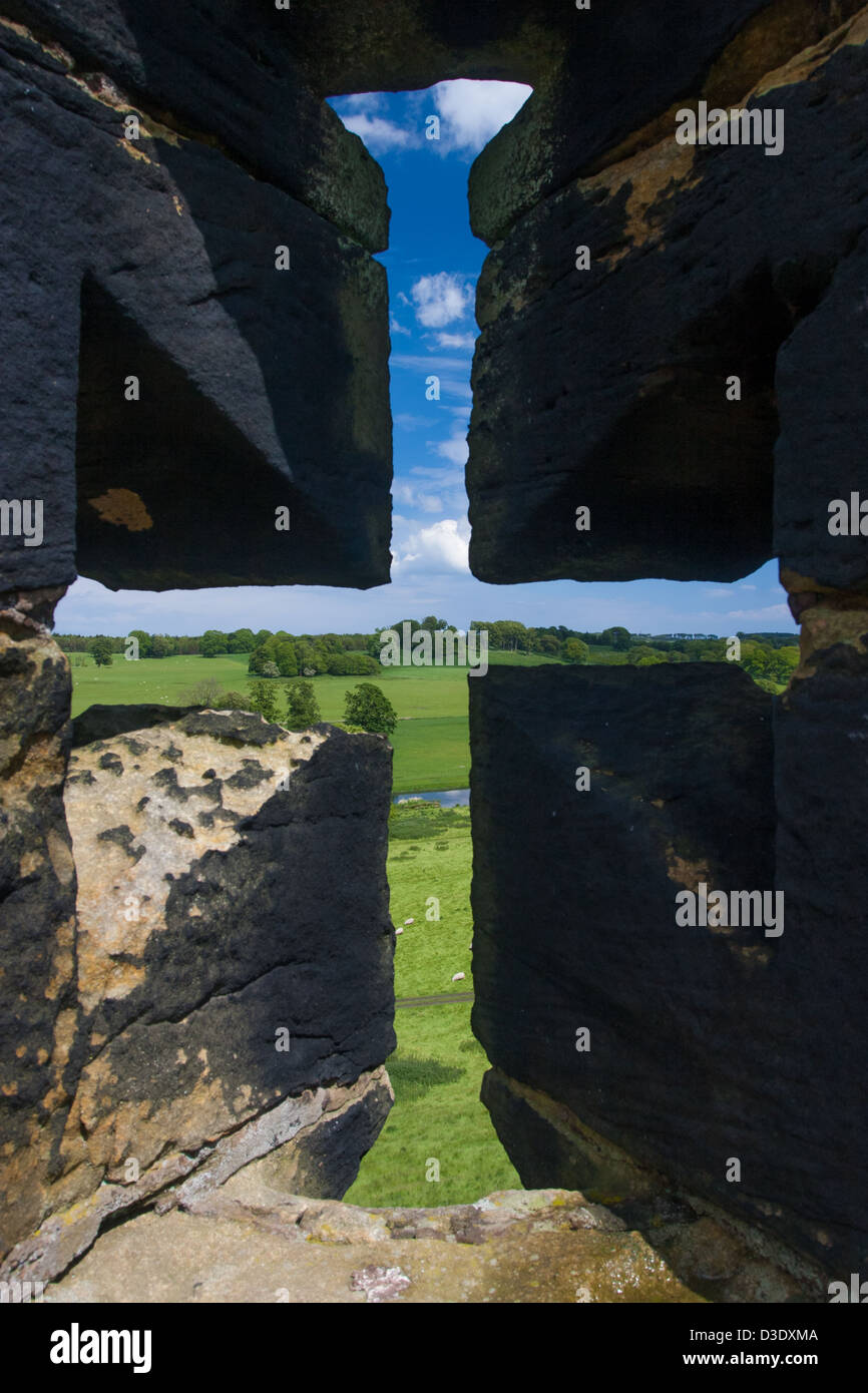 View through a loophole at Alnwick Castle Stock Photo - Alamy