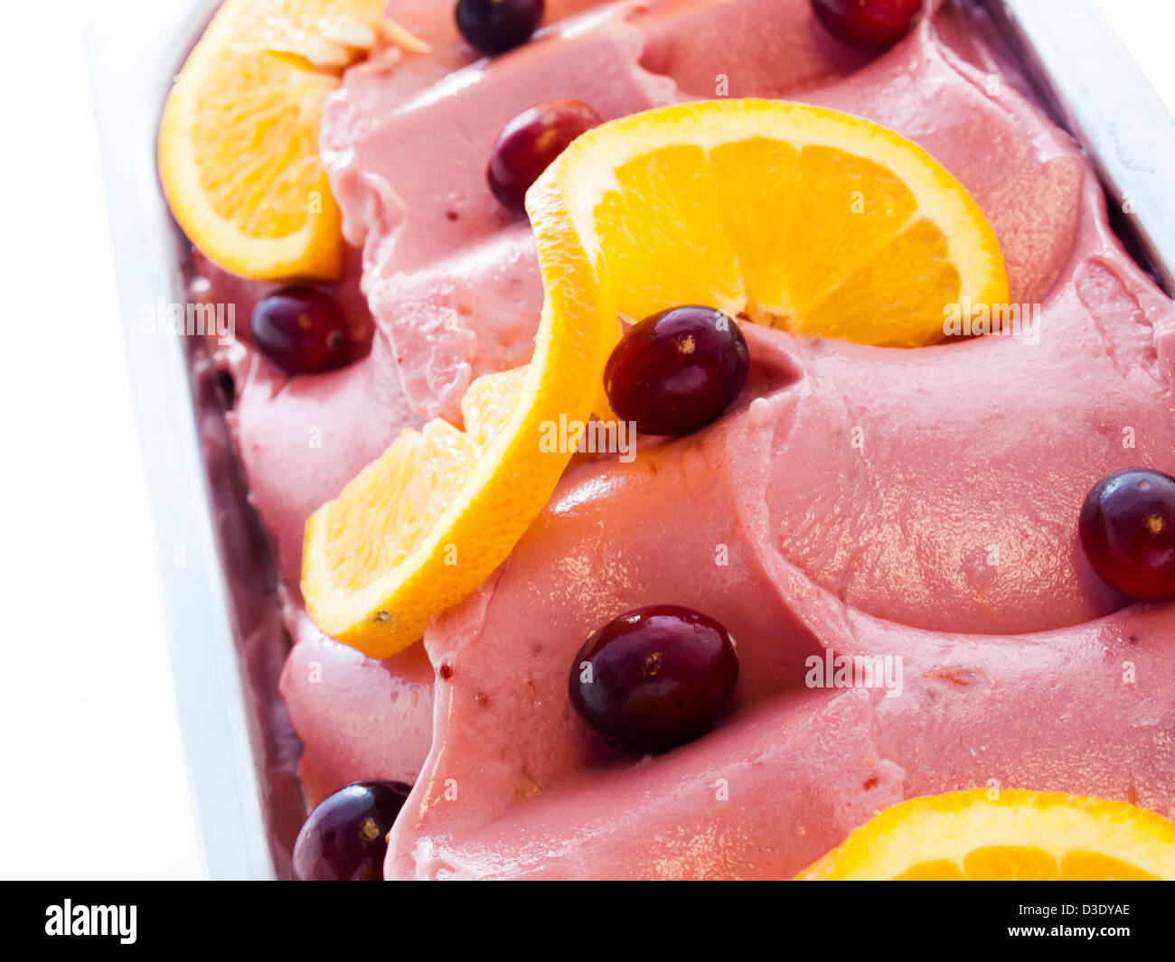 Gourmet sweet orange and cranberry gelato on white background Stock ...