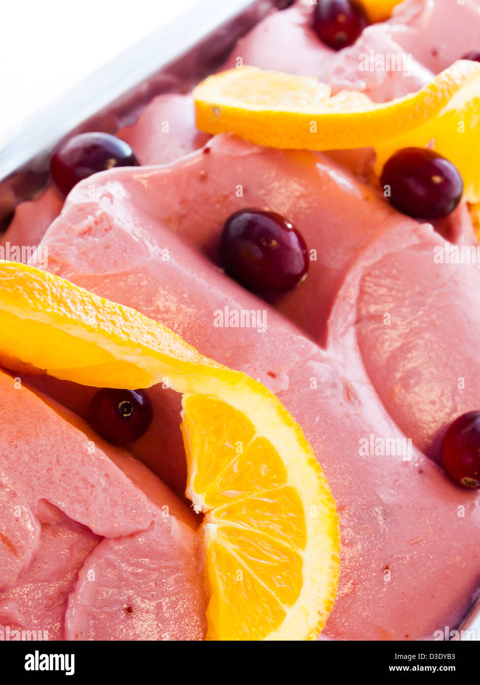 Gourmet sweet orange and cranberry gelato on white background Stock ...