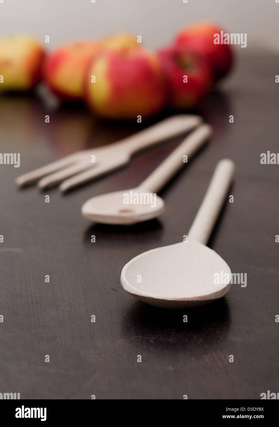 Wooden kitchen spoon on desk Stock Photo - Alamy