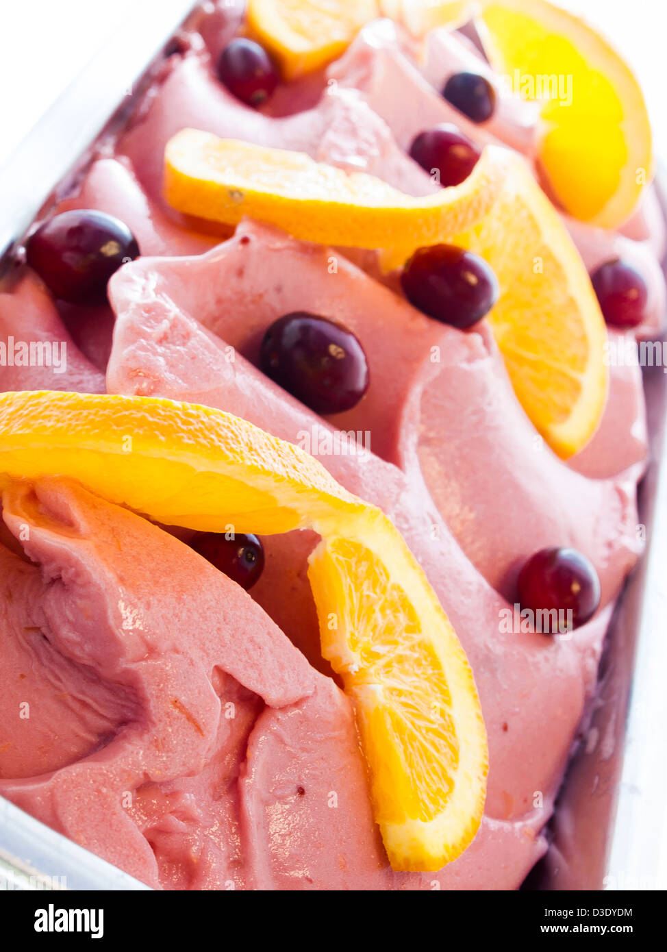 Gourmet sweet orange and cranberry gelato on white background Stock ...