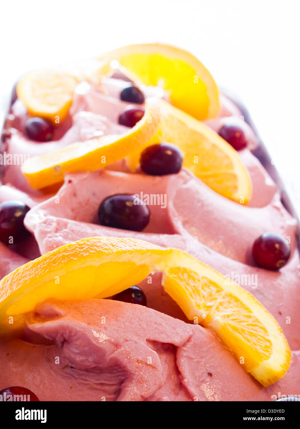 Gourmet sweet orange and cranberry gelato on white background Stock ...