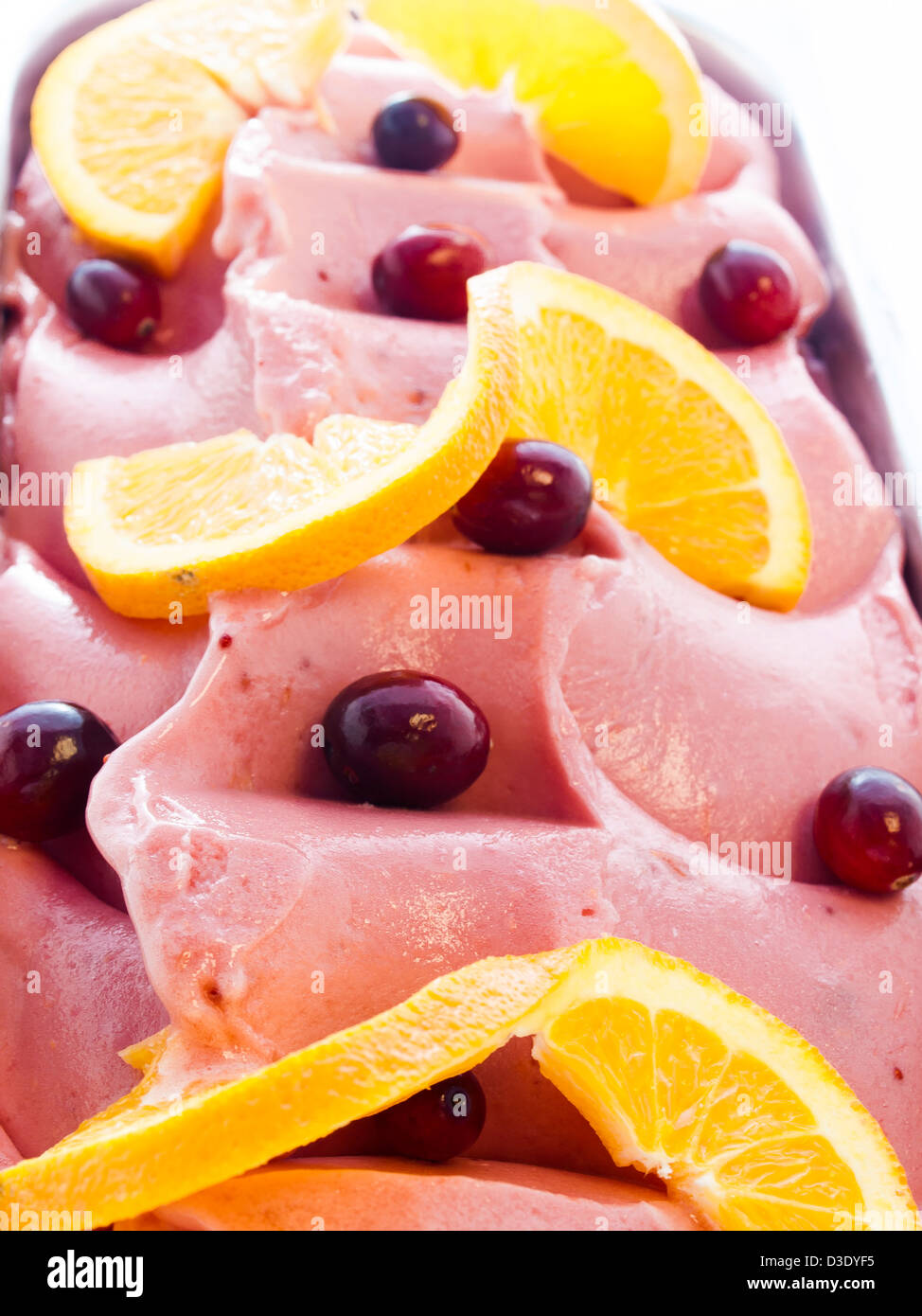 Gourmet sweet orange and cranberry gelato on white background Stock ...