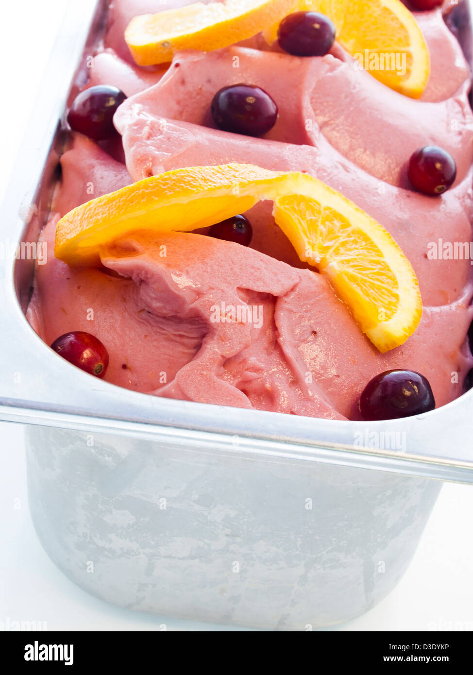 Gourmet sweet orange and cranberry gelato on white background Stock ...