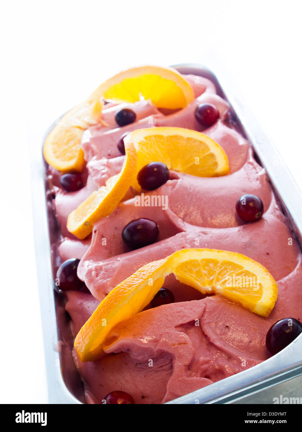 Gourmet sweet orange and cranberry gelato on white background Stock ...