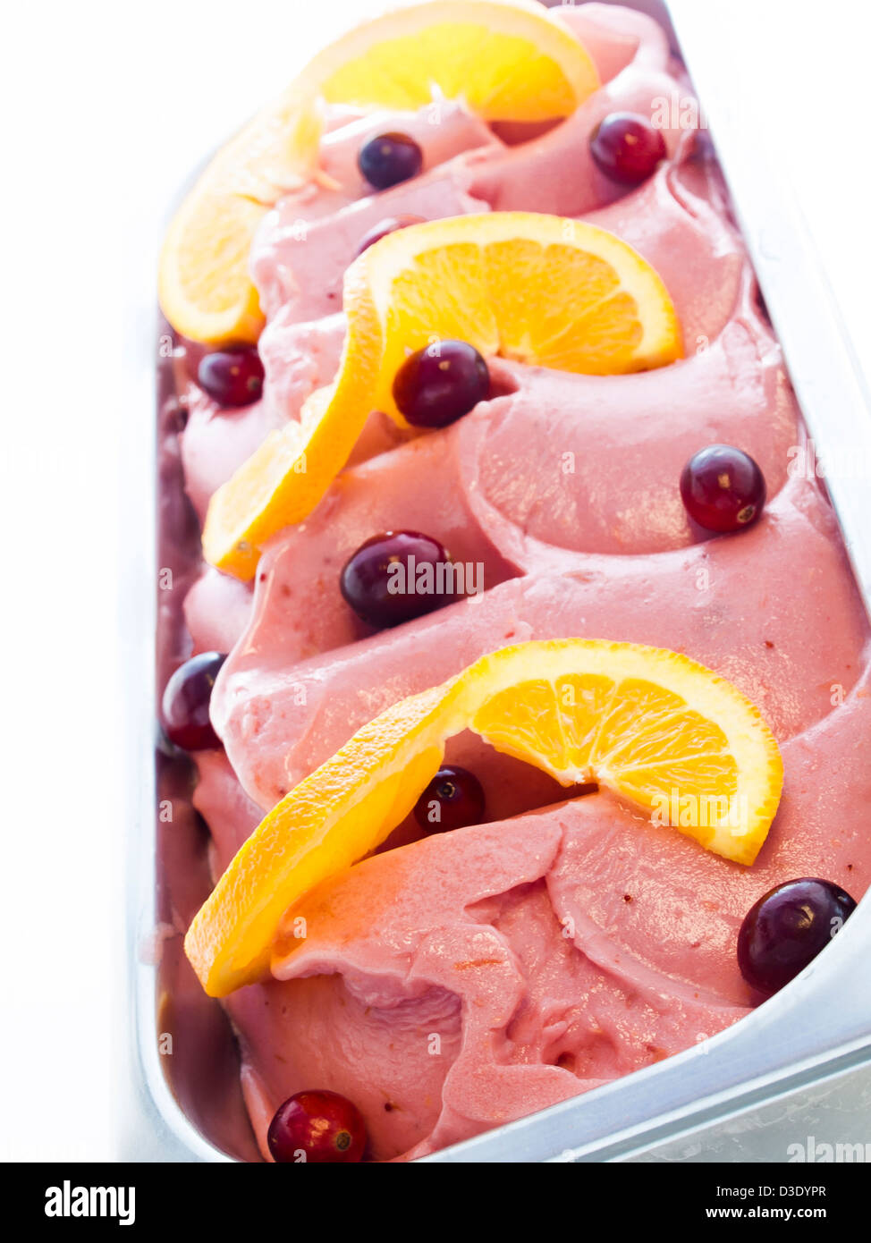 Gourmet sweet orange and cranberry gelato on white background Stock ...