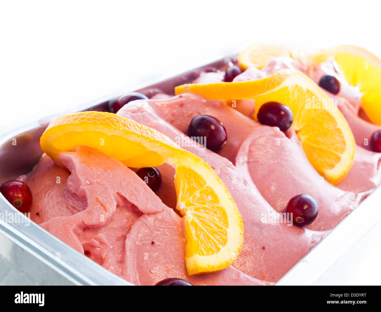 Gourmet sweet orange and cranberry gelato on white background Stock ...