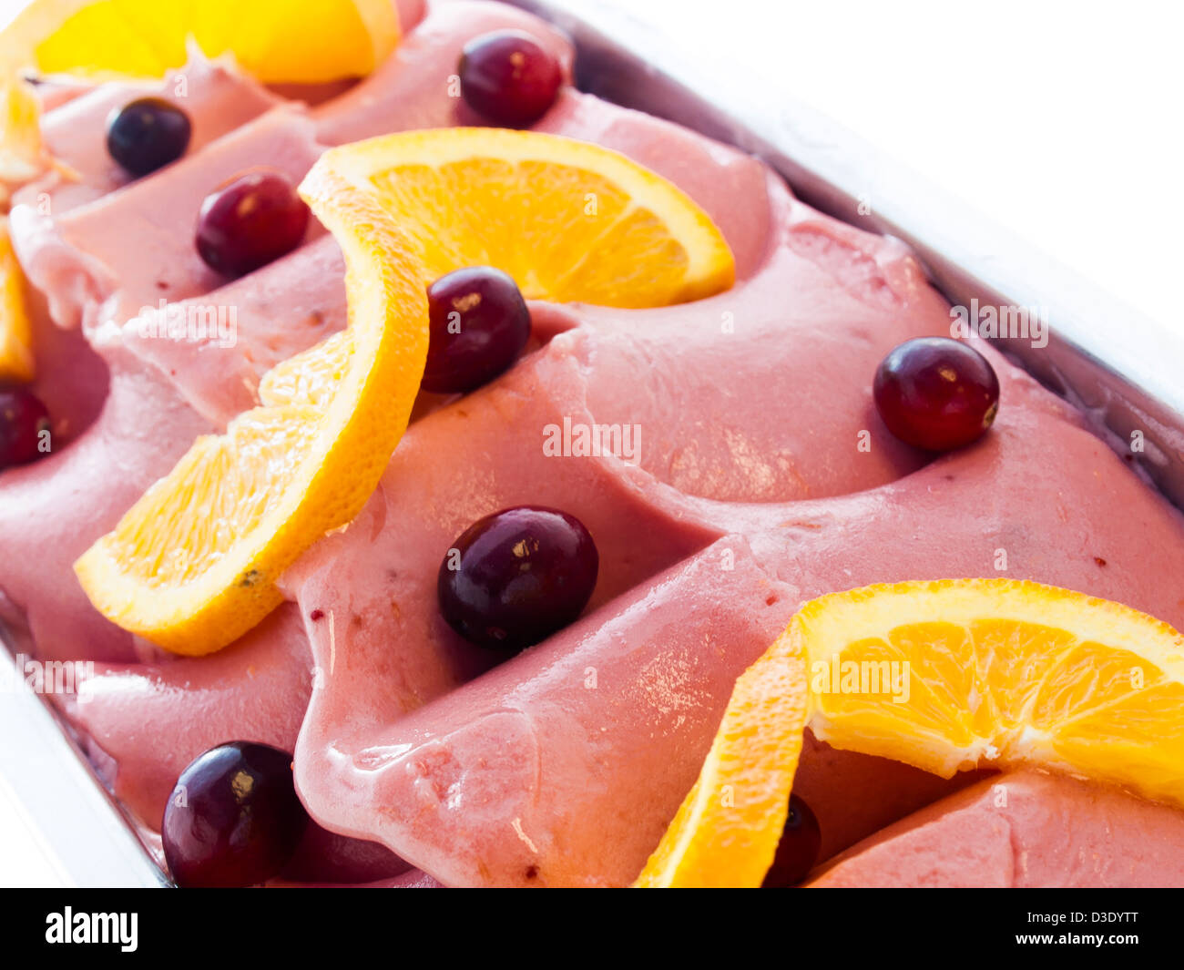Gourmet sweet orange and cranberry gelato on white background Stock ...