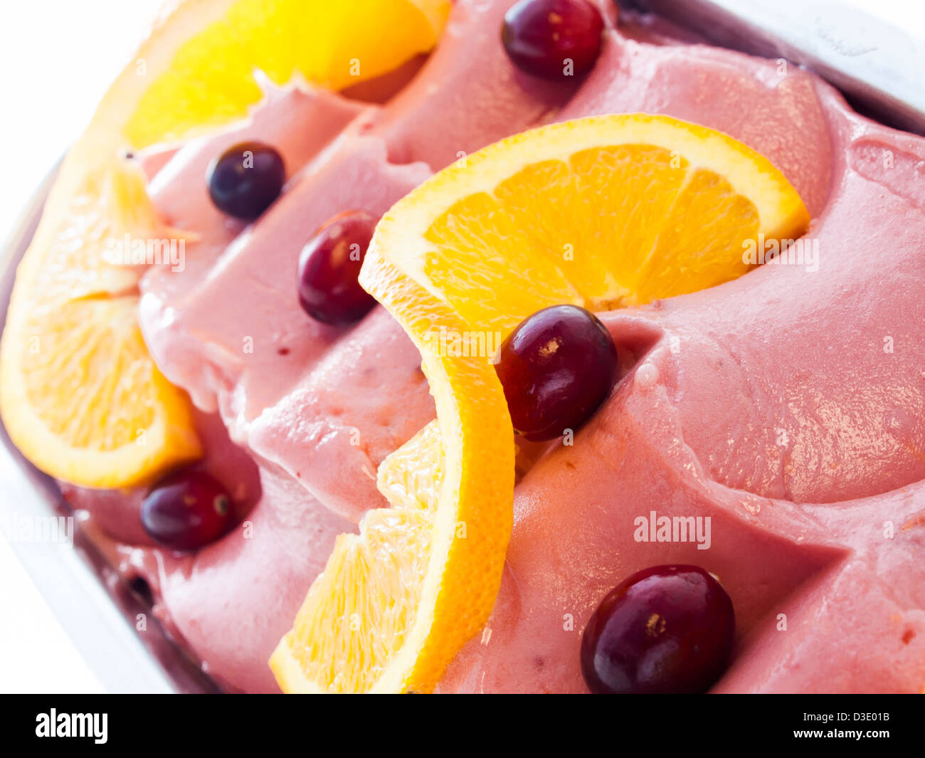 Gourmet sweet orange and cranberry gelato on white background Stock ...