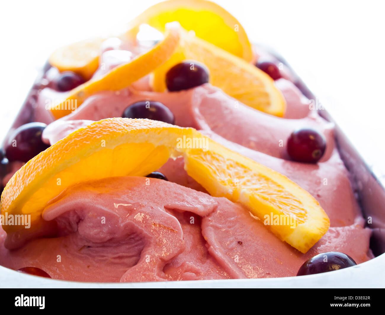 Gourmet sweet orange and cranberry gelato on white background Stock ...