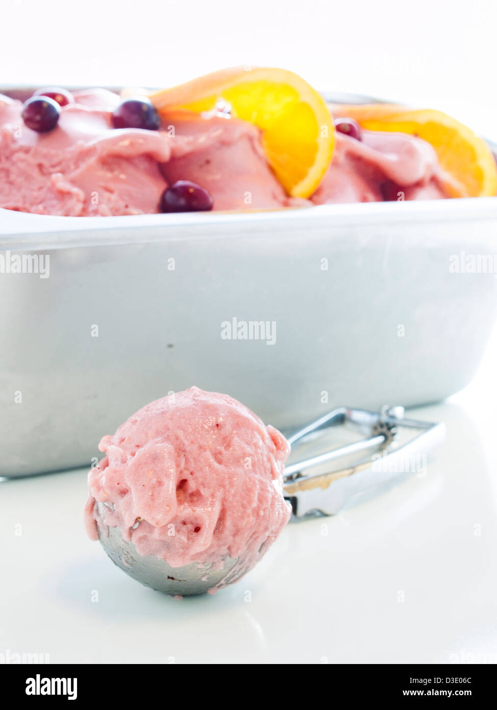 Gourmet sweet orange and cranberry gelato on white background Stock ...