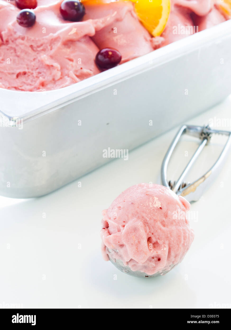Gourmet sweet orange and cranberry gelato on white background Stock ...