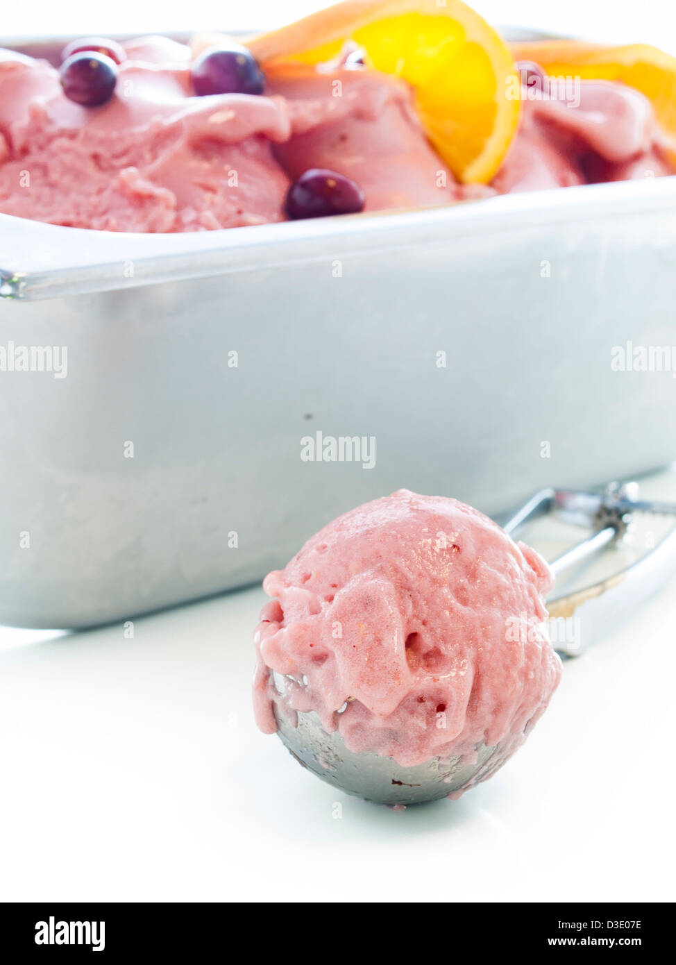 Gourmet sweet orange and cranberry gelato on white background Stock ...