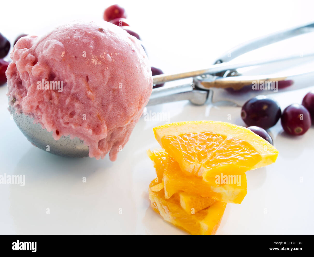 Gourmet sweet orange and cranberry gelato on white background Stock ...