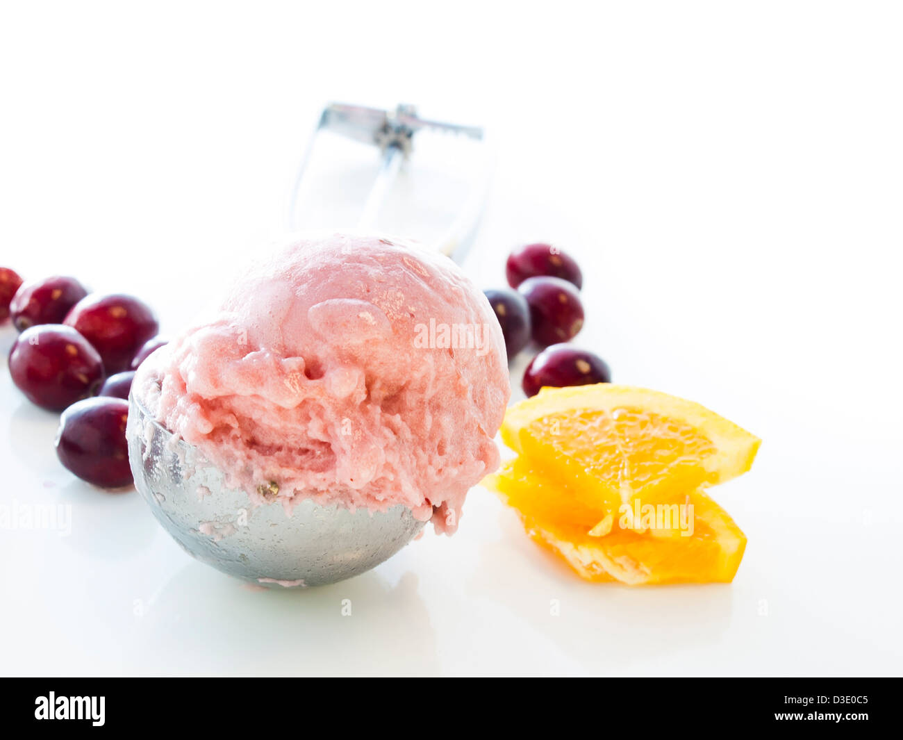 Gourmet sweet orange and cranberry gelato on white background Stock ...