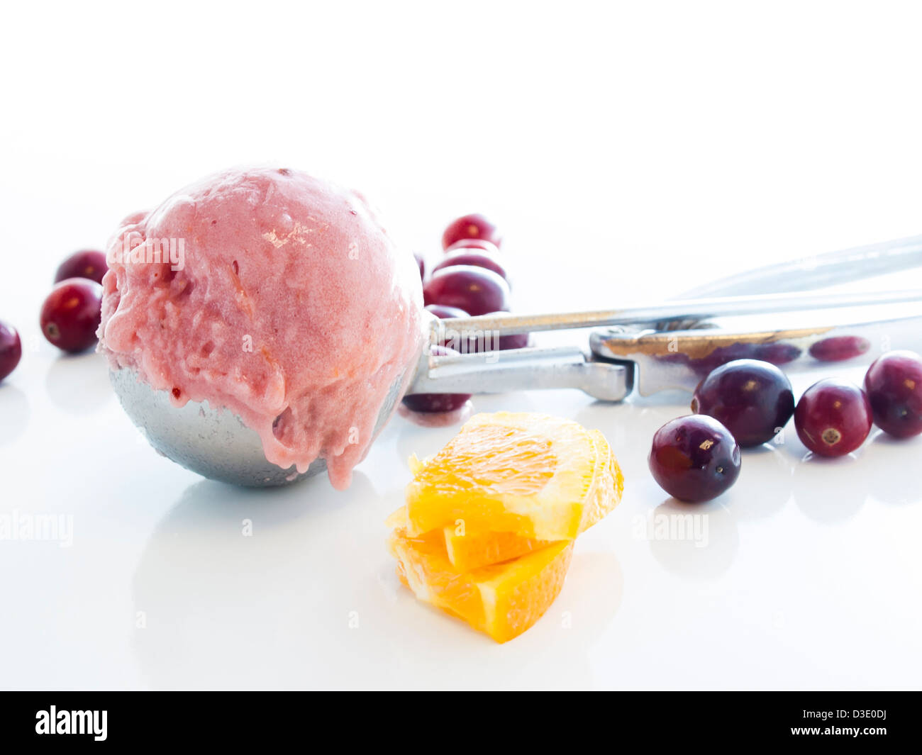 Gourmet sweet orange and cranberry gelato on white background Stock ...