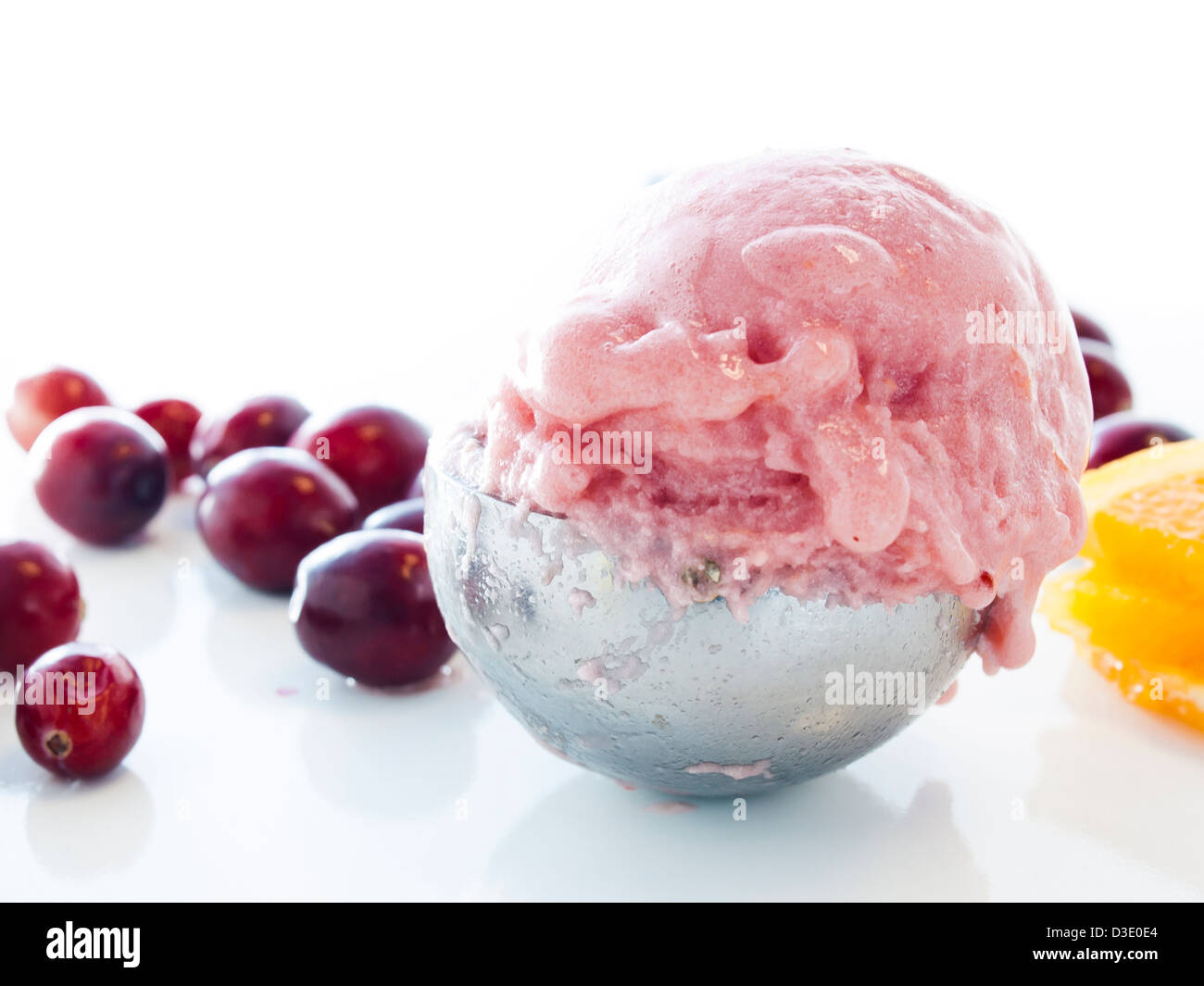 Gourmet sweet orange and cranberry gelato on white background Stock ...