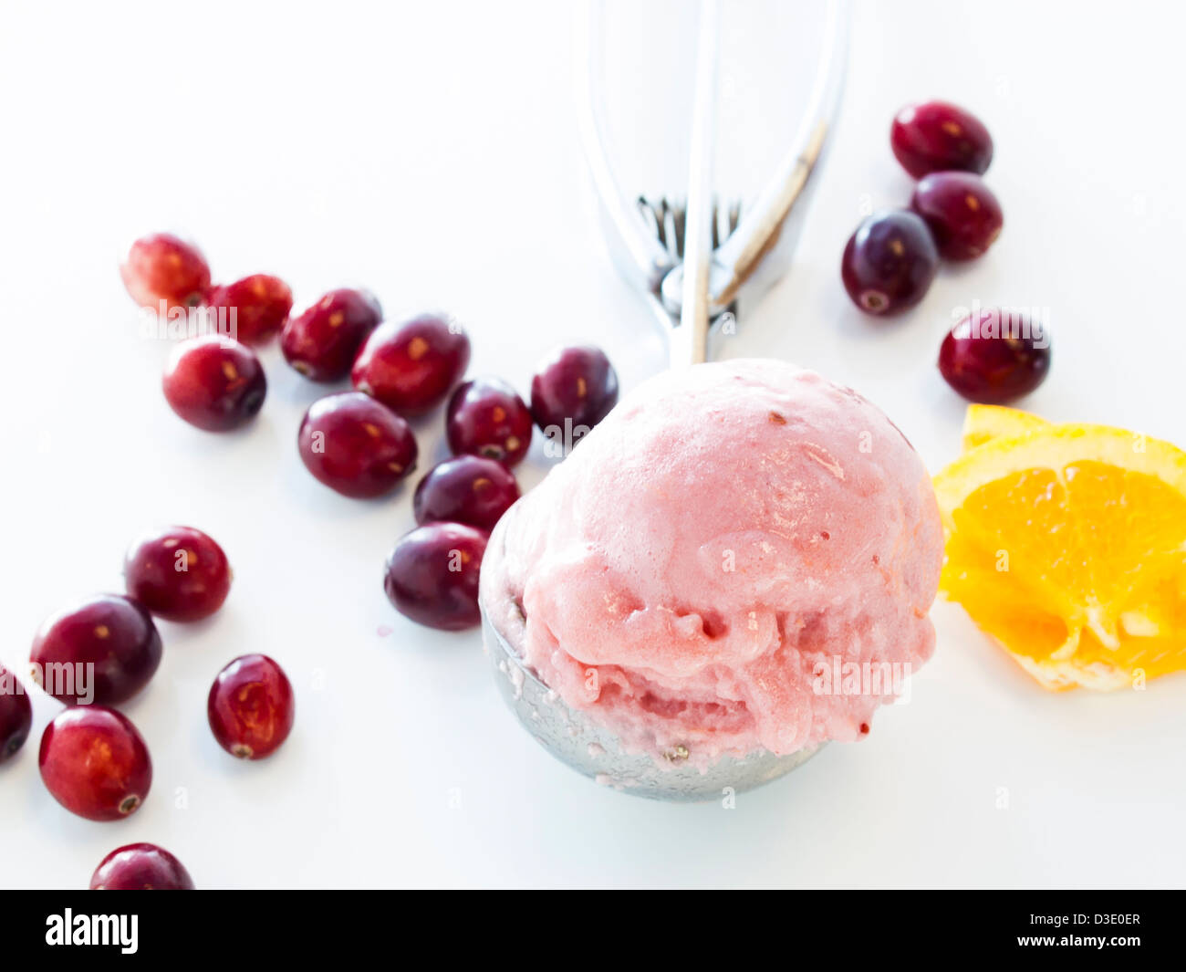 Gourmet sweet orange and cranberry gelato on white background Stock ...