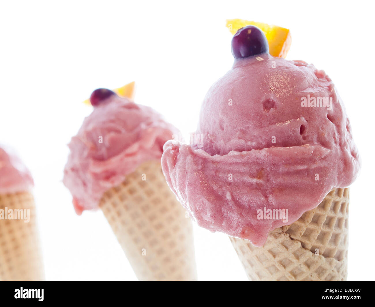 Gourmet sweet orange and cranberry gelato on white background Stock ...