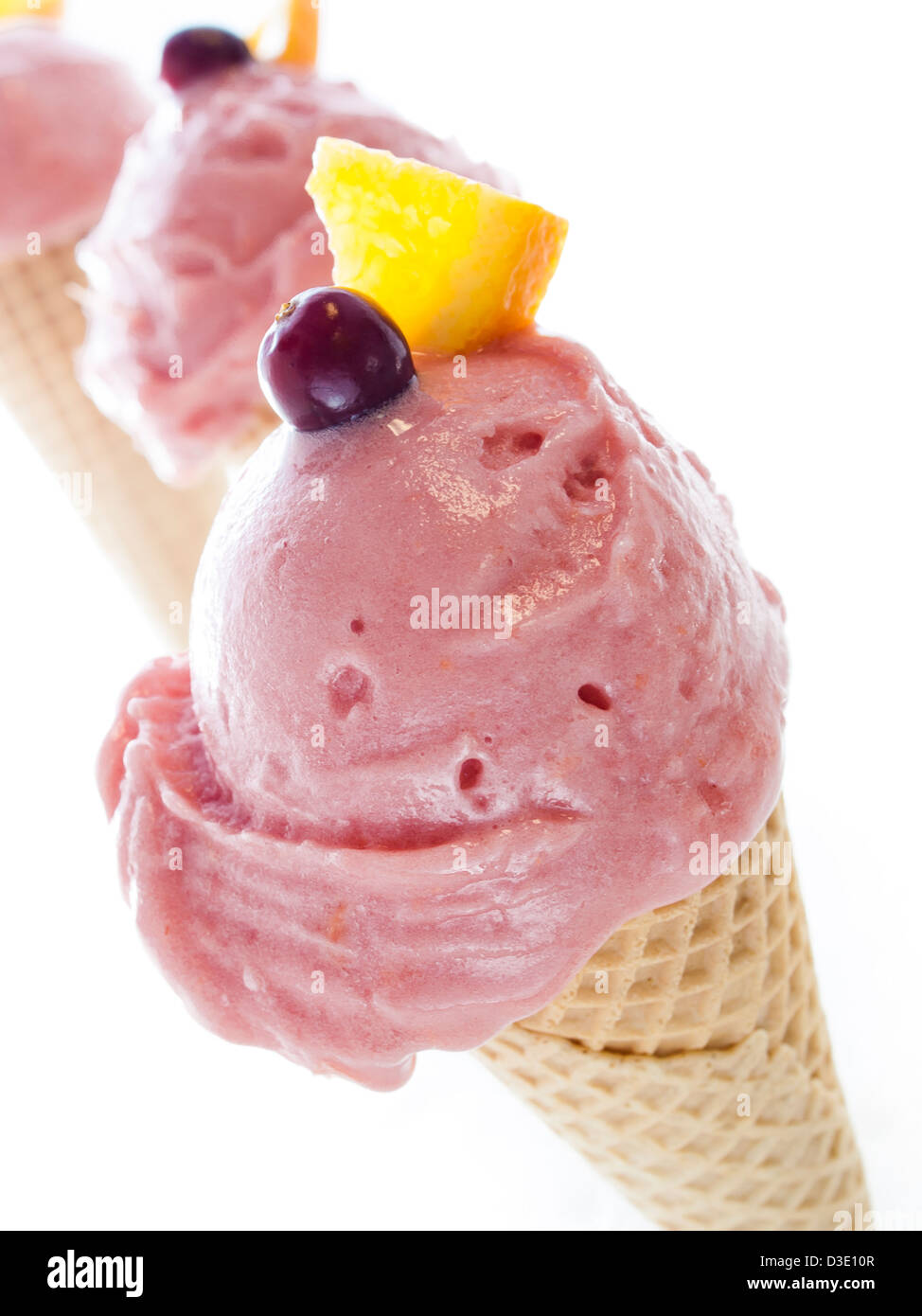 Gourmet sweet orange and cranberry gelato on white background Stock ...