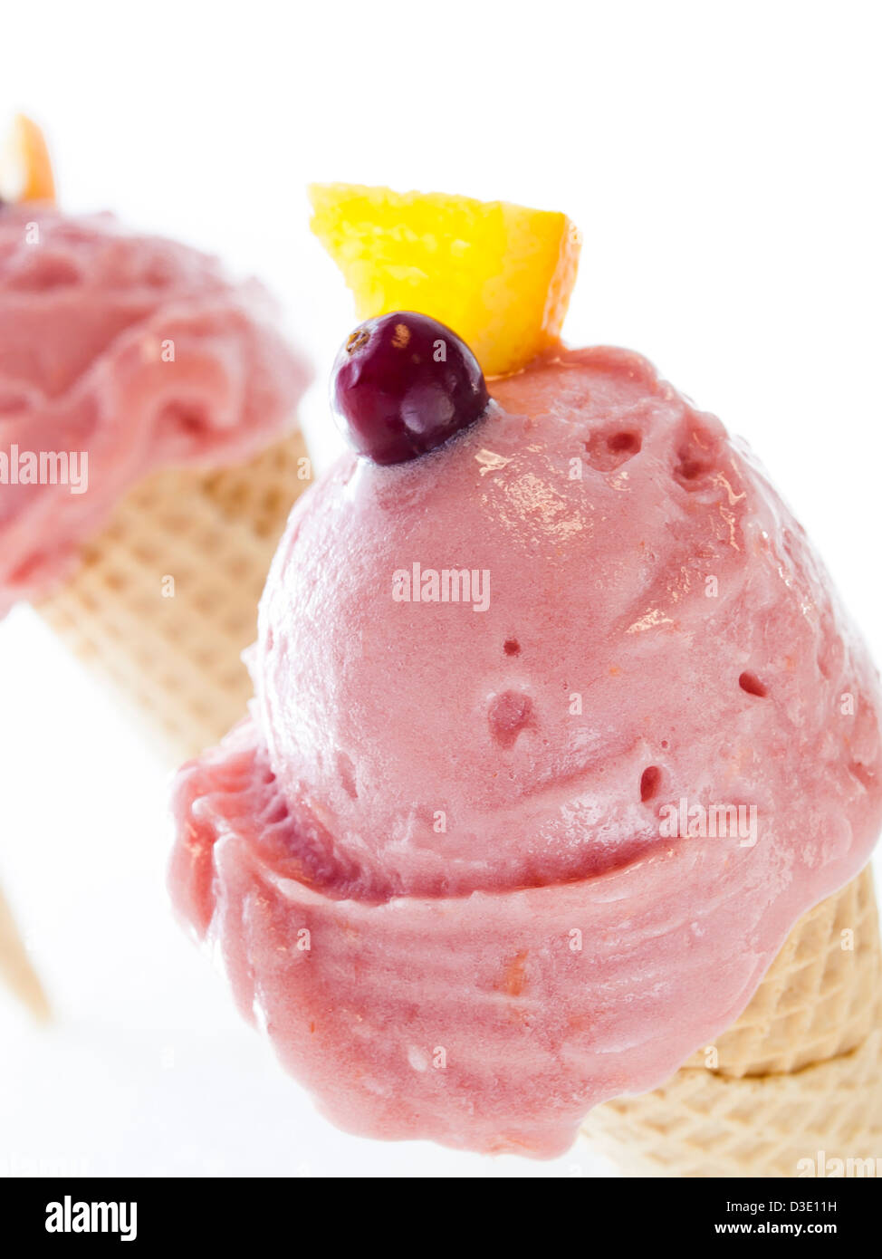Gourmet sweet orange and cranberry gelato on white background Stock ...