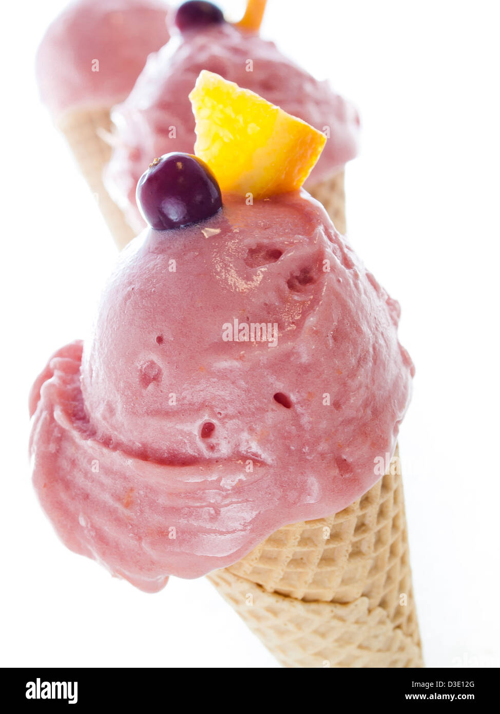 Gourmet sweet orange and cranberry gelato on white background Stock ...
