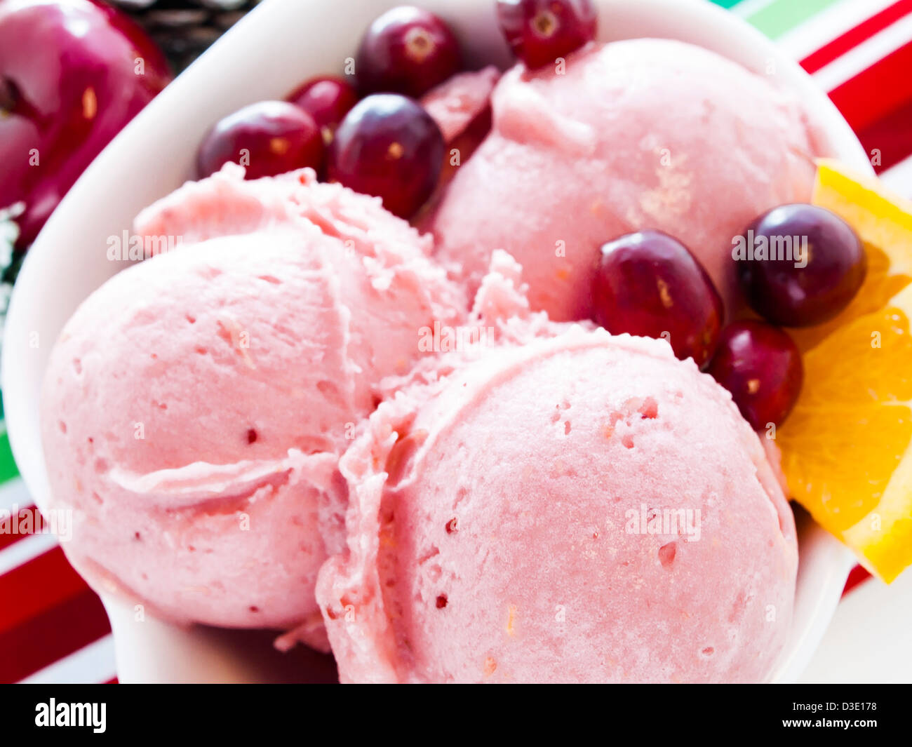 Gourmet sweet orange and cranberry gelato on white background Stock ...
