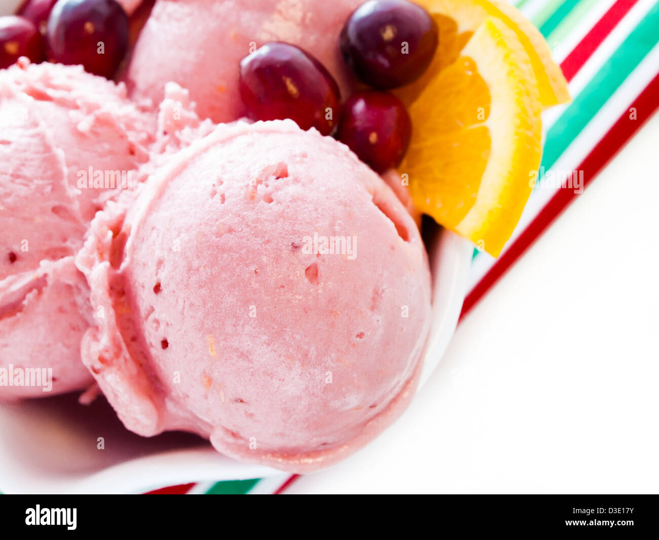 Gourmet sweet orange and cranberry gelato on white background Stock ...