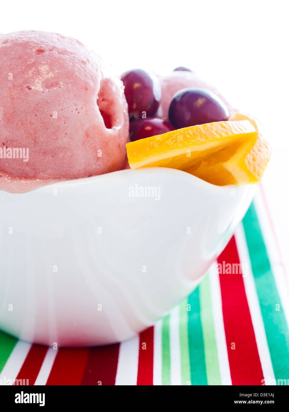 Gourmet sweet orange and cranberry gelato on white background Stock ...
