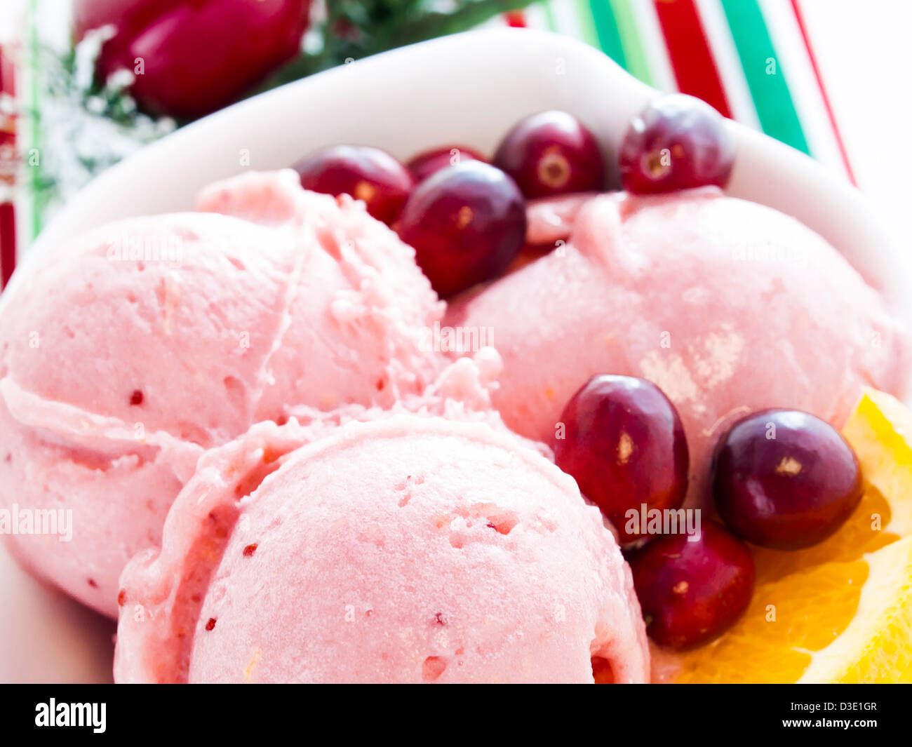 Gourmet sweet orange and cranberry gelato on white background Stock ...