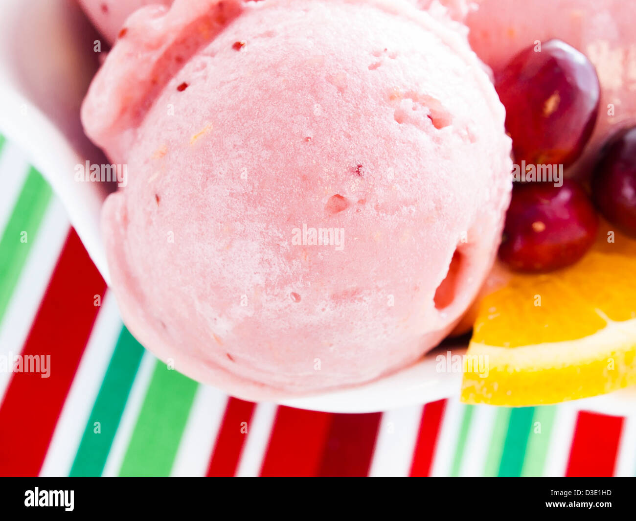 Gourmet sweet orange and cranberry gelato on white background Stock ...