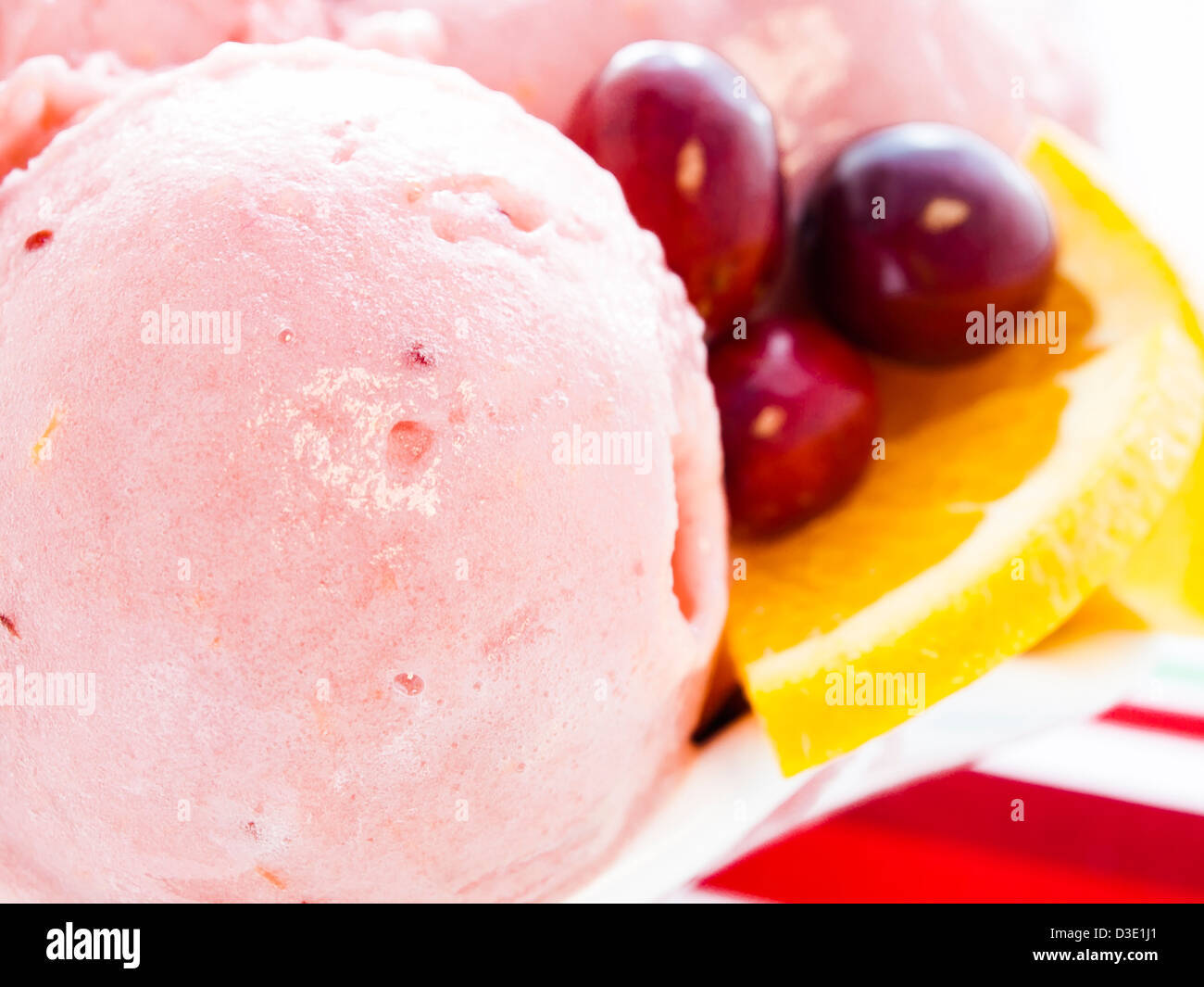Gourmet sweet orange and cranberry gelato on white background Stock ...