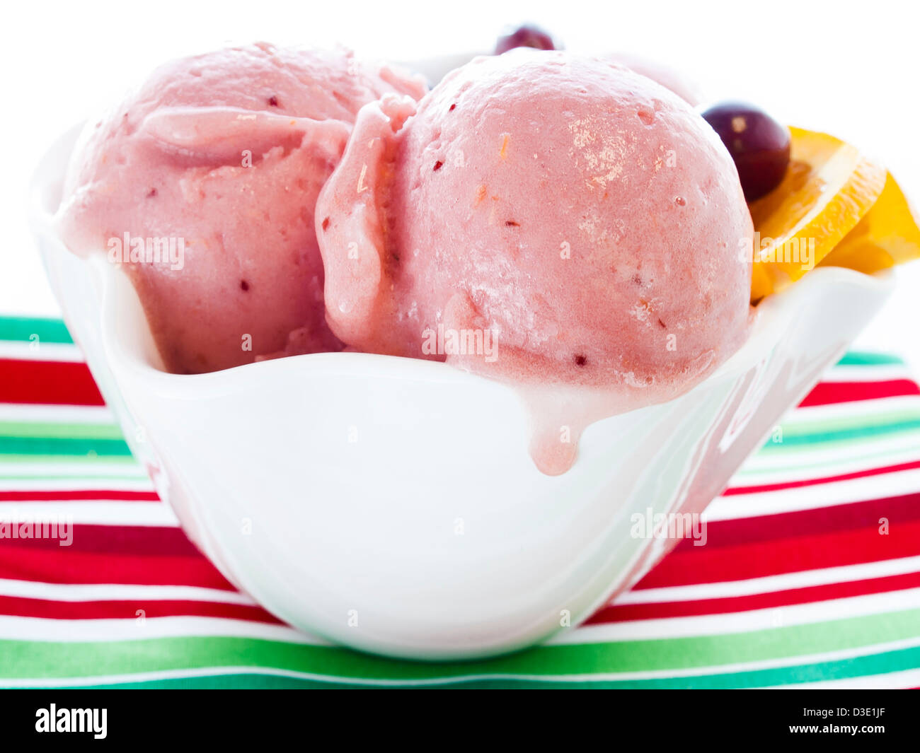 Gourmet sweet orange and cranberry gelato on white background Stock ...