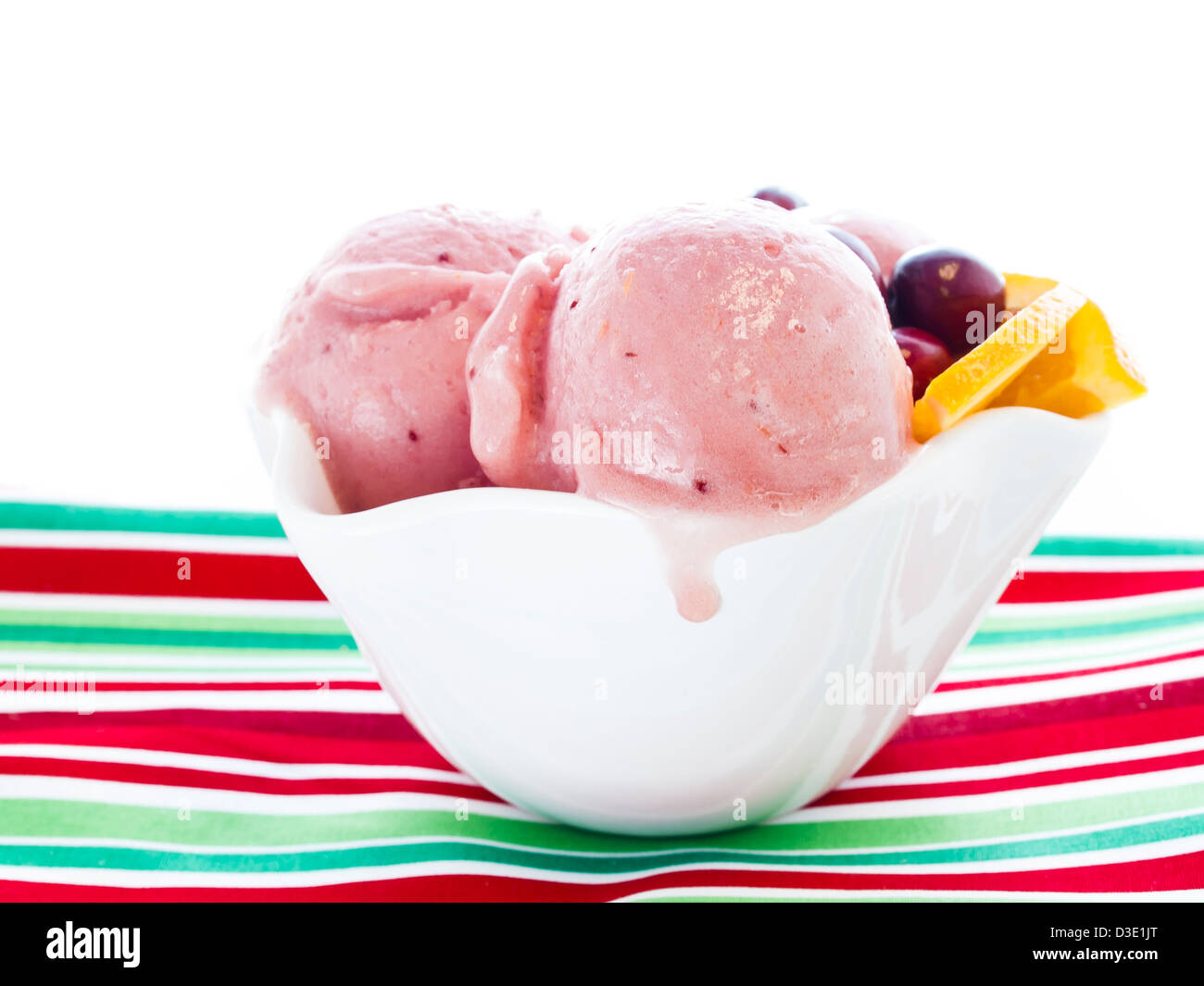 Gourmet sweet orange and cranberry gelato on white background Stock ...