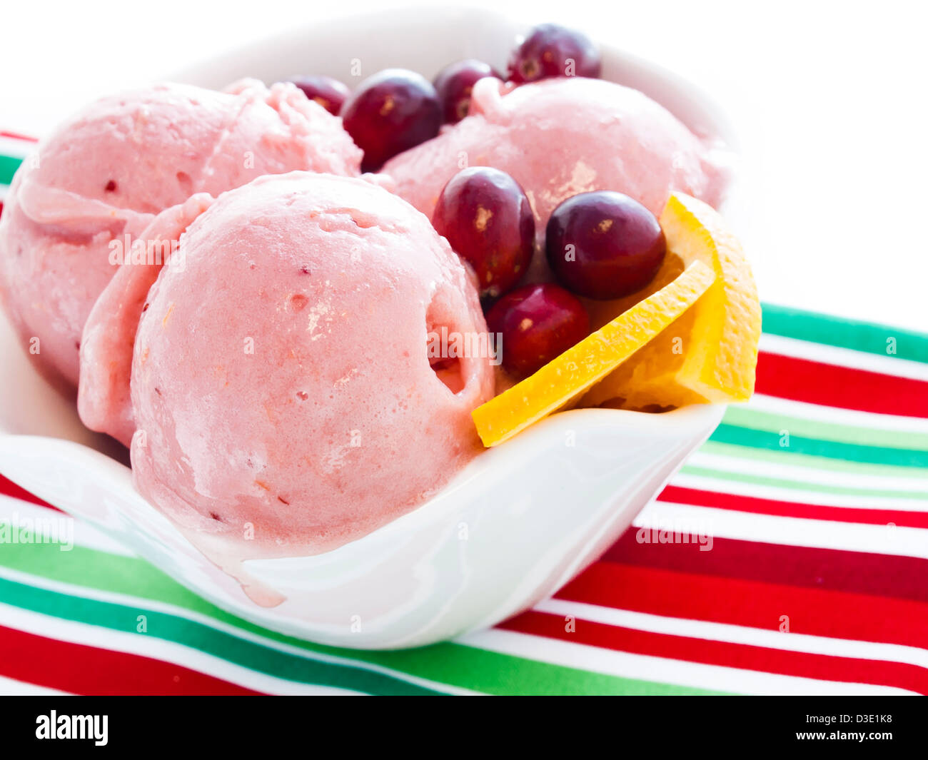 Gourmet sweet orange and cranberry gelato on white background Stock ...
