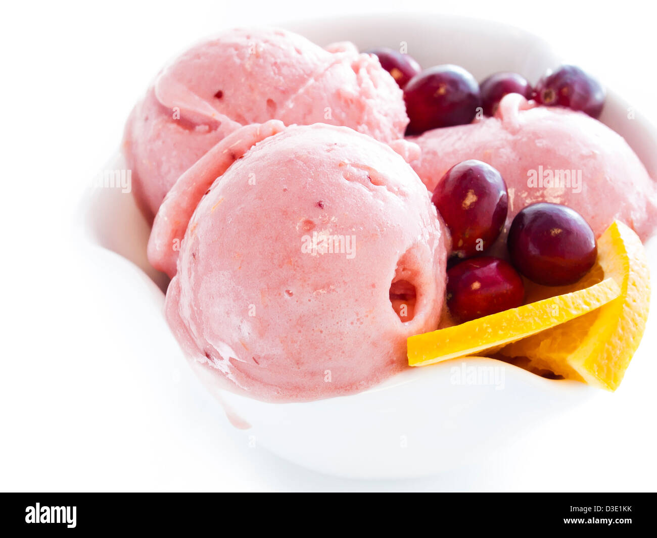 Gourmet sweet orange and cranberry gelato on white background Stock ...