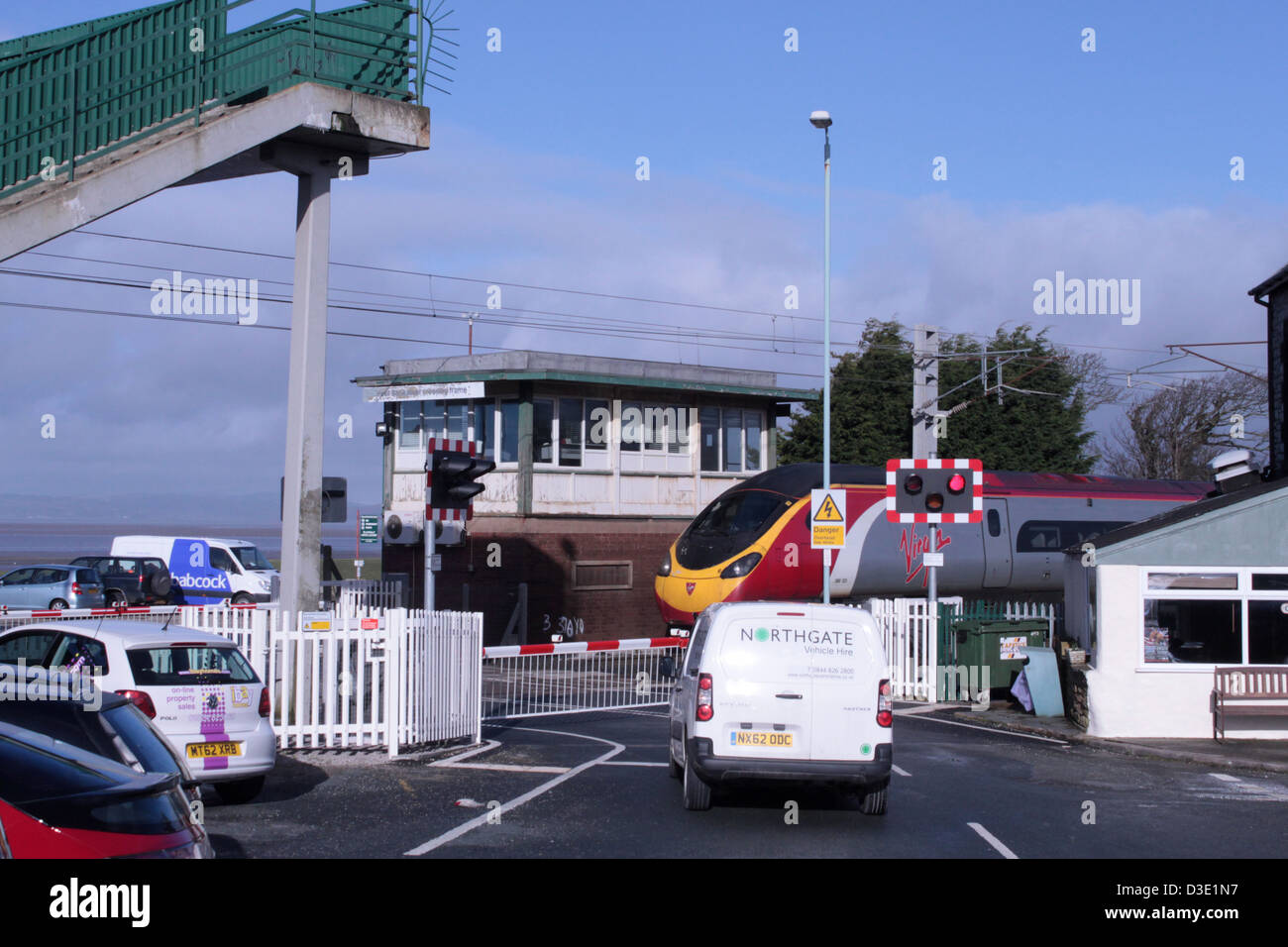 Hest Bank level crossing and signalbox with pendolino train passing ...