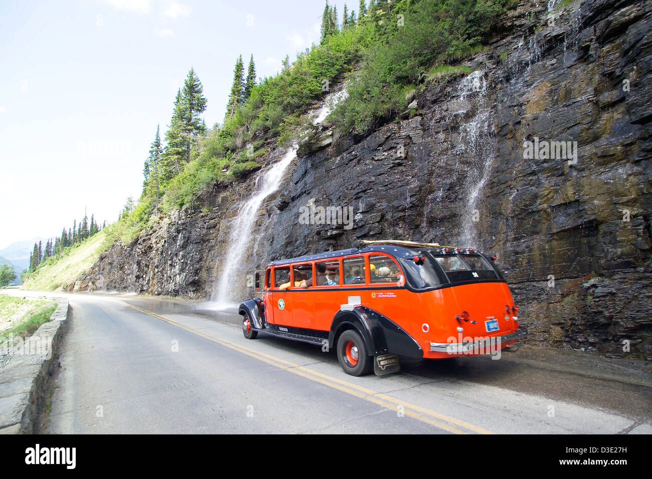 The Red Bus, a historic tour vehicle, offers guided trips along Glacier ...