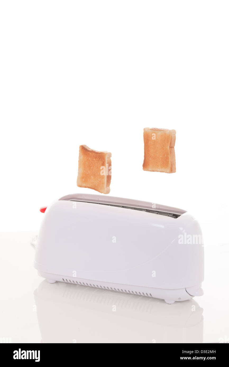 Toast popping out of a toaster Stock Photo - Alamy
