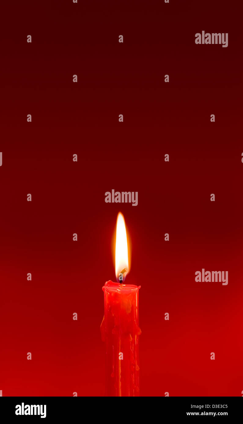 A Red Candle Stock Photo - Alamy
