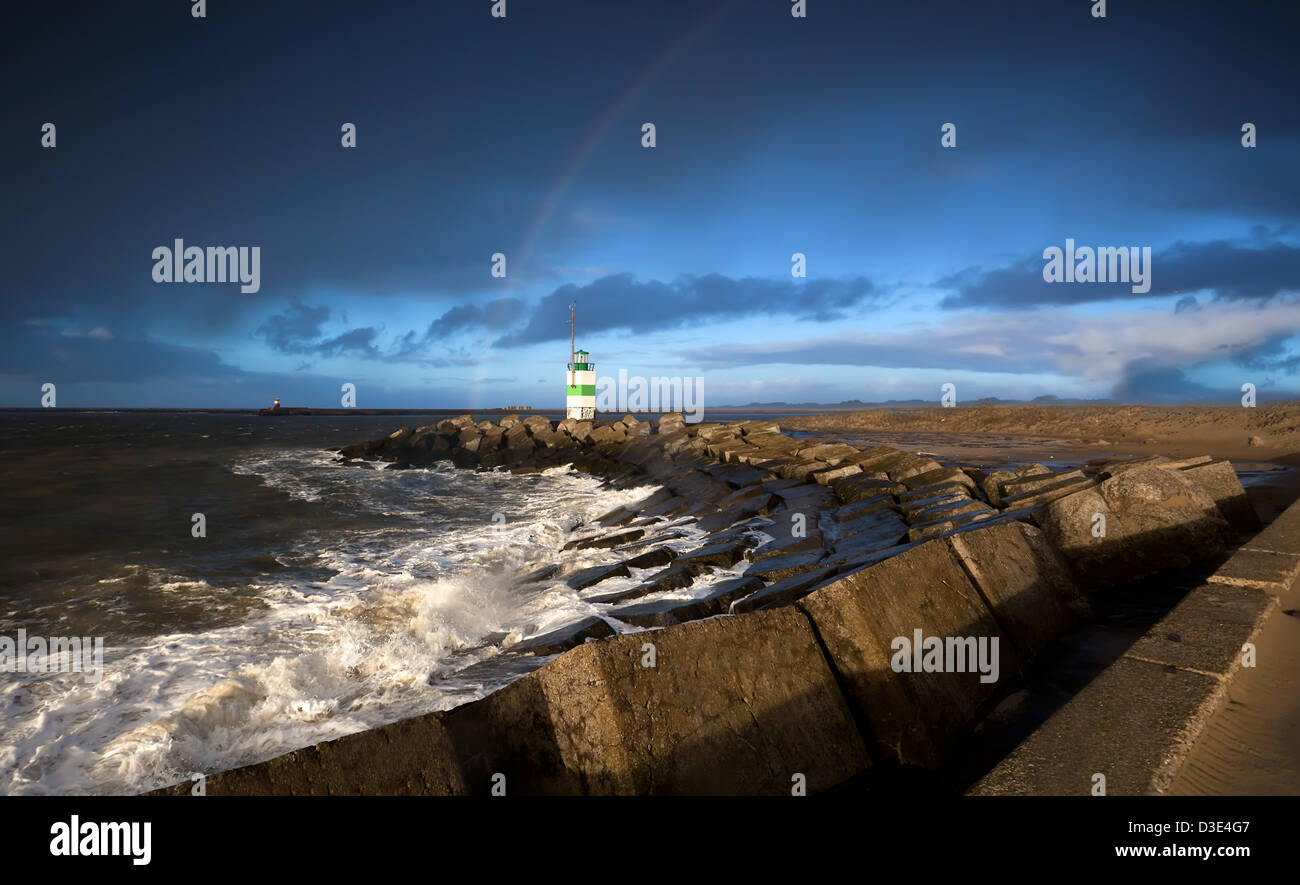 rainbow over lighthouse after the storm, Netherlands Stock Photo - Alamy