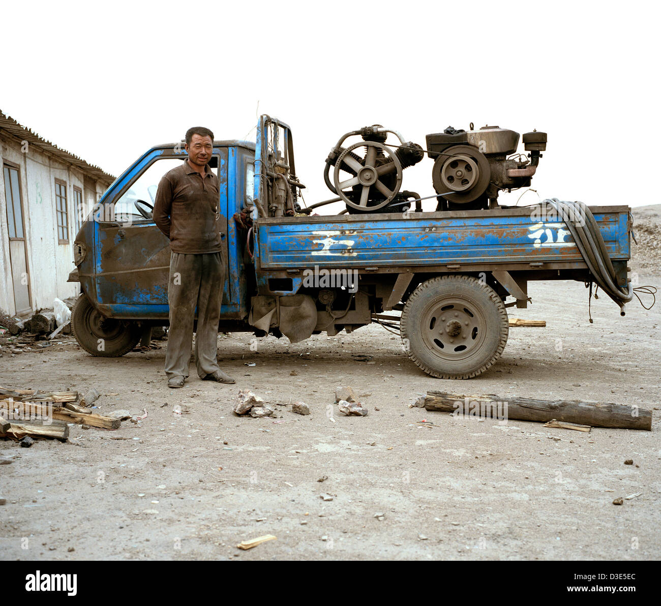 WU HAI, INNER MONGOLIA, CHINA - AUGUST 2007: Sun Lian Yu, 60, with his ...