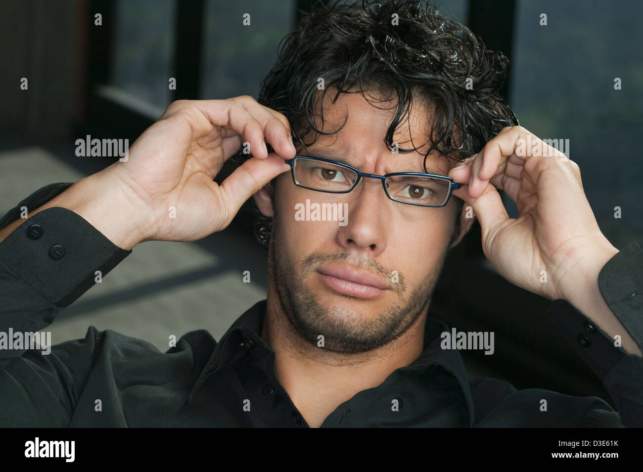 Young Man With Odd Facial Expression Stock Photo - Alamy