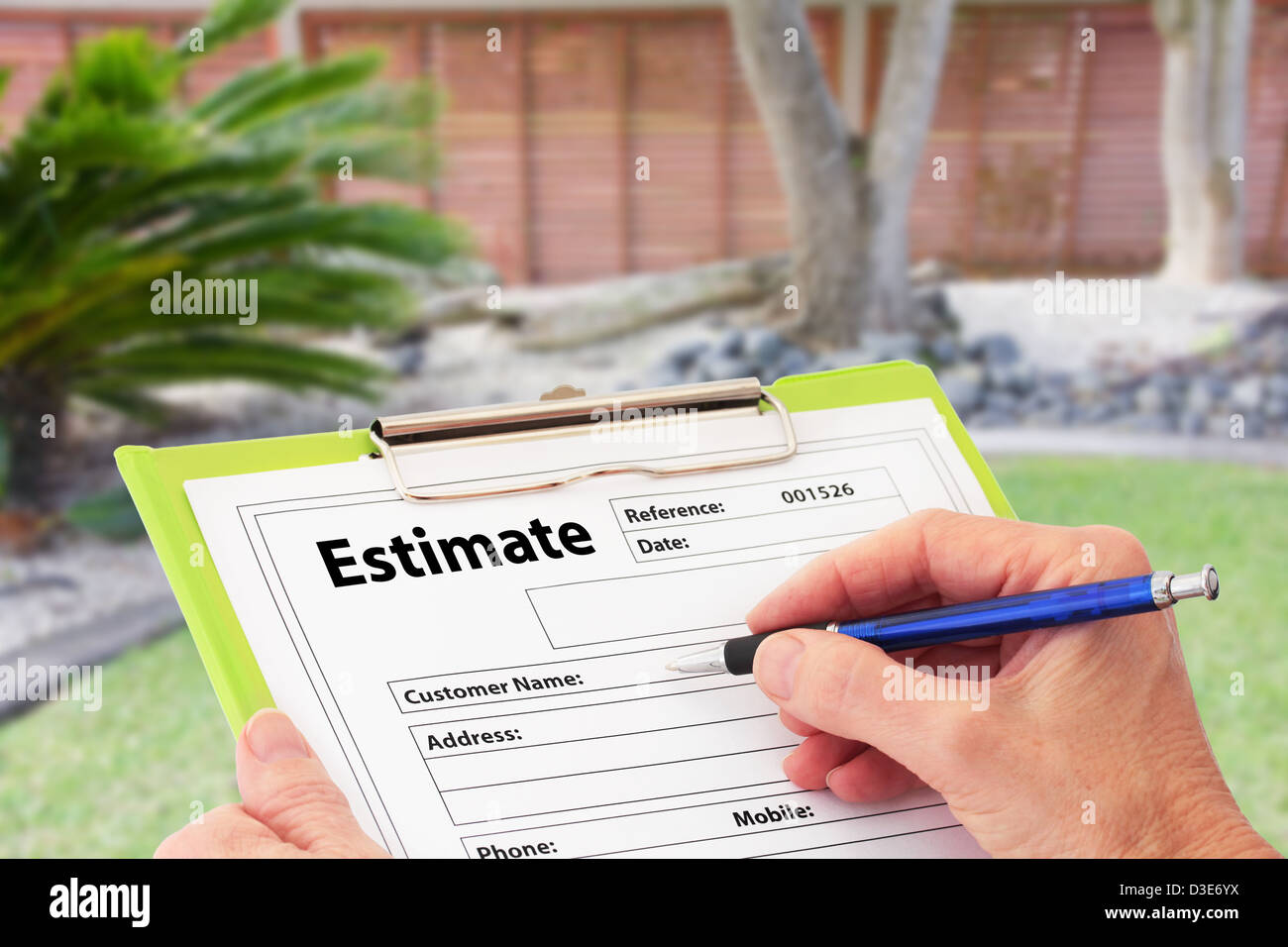 Hand Writing an Estimate for Garden Maintenance Stock Photo - Alamy
