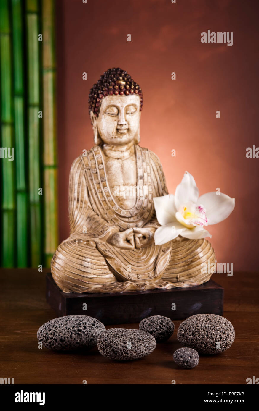 Still life with Buddha statue and bamboo Stock Photo - Alamy